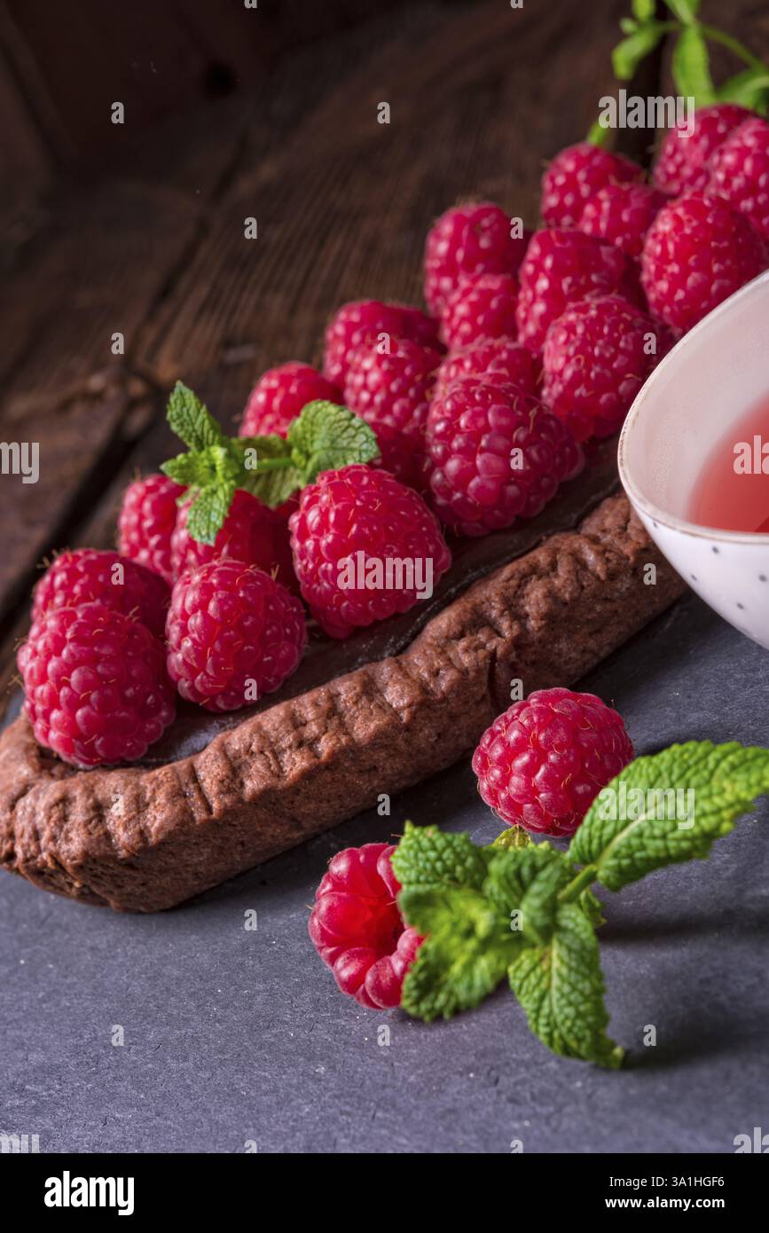 Delicious raspberry chocolate tart with ricotta cheese Stock Photo - Alamy
