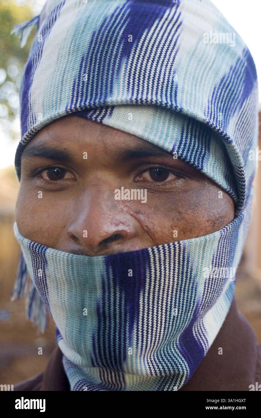 Rural man covered face protecting from cold, Jharkhand, India, Asia ...