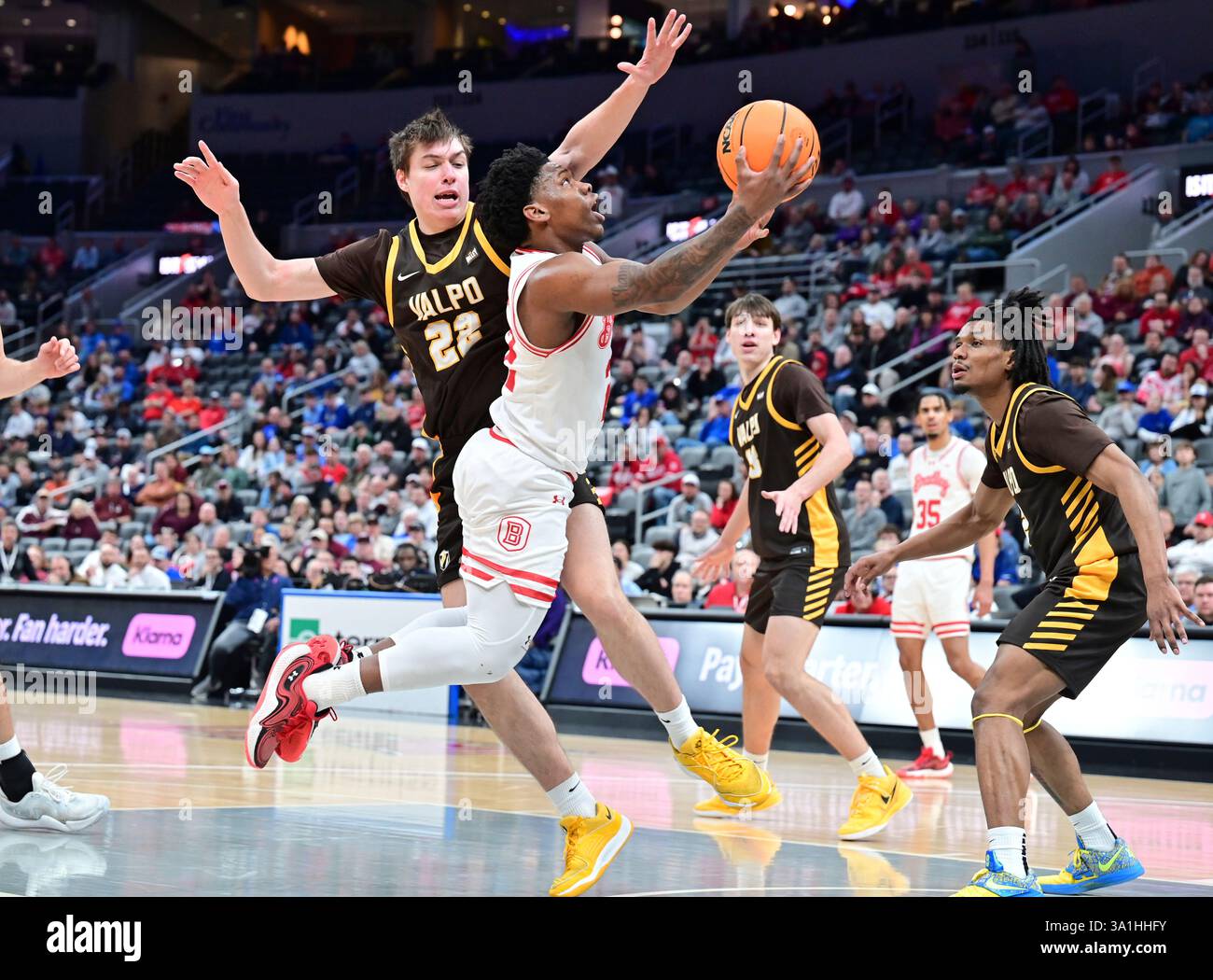ST. LOUIS, MO - MARCH 08: Bradley guard Jaquan Johnson (22) drives to ...
