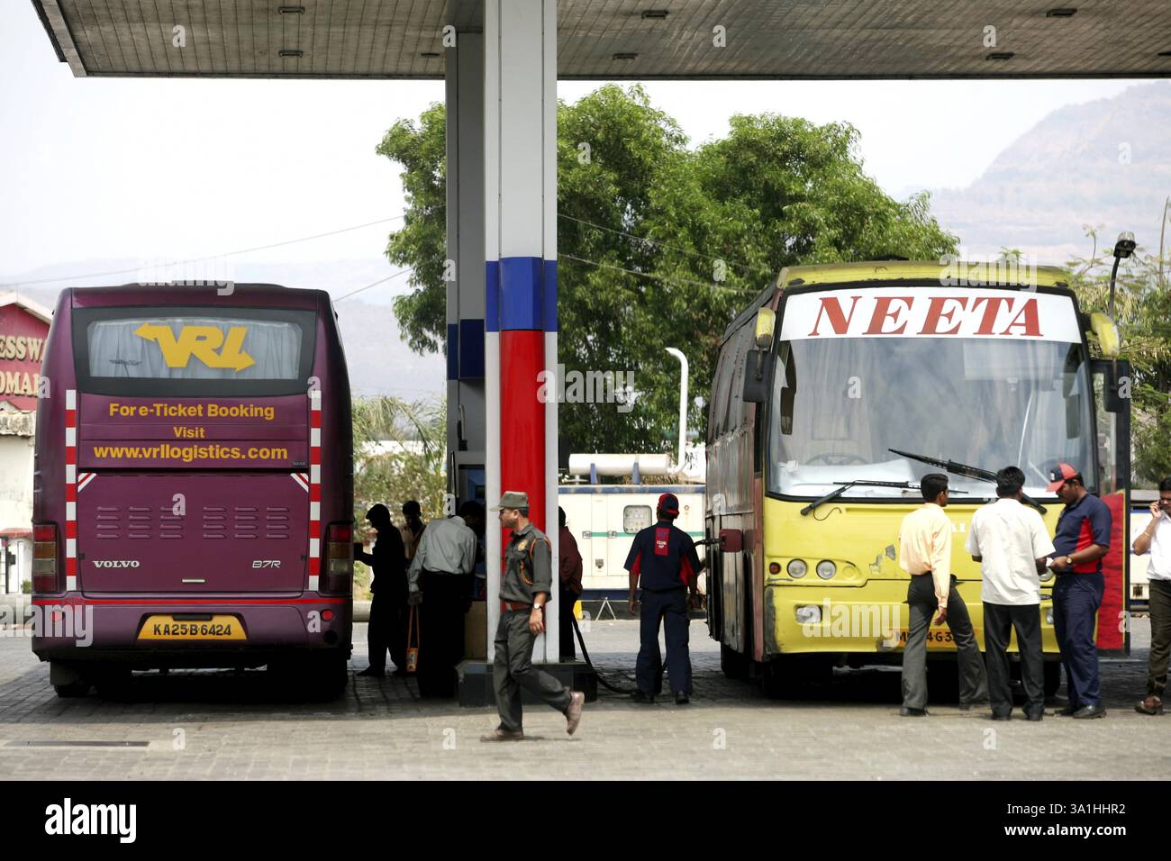 Tourist buses refilling at the petrol pump on Mumbai-Pune expressway ...