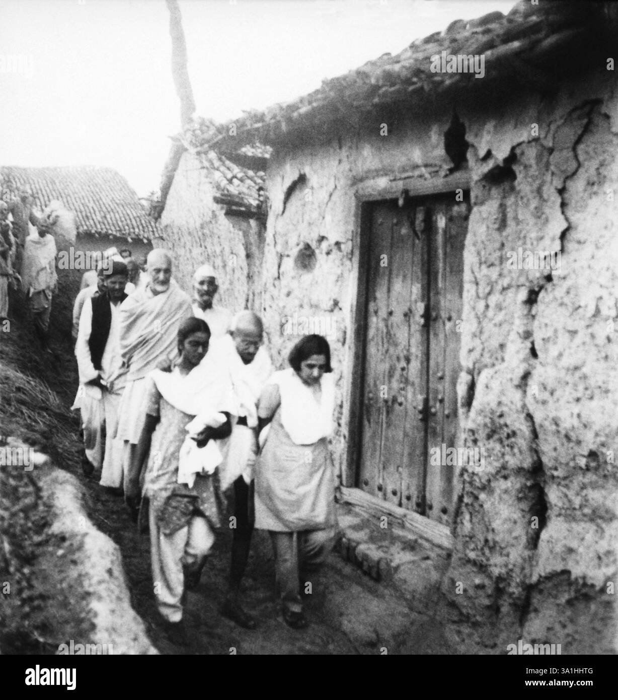 Mahatma Gandhi, supported by Mridulabehn Sarabai and Manu Gandhi ...