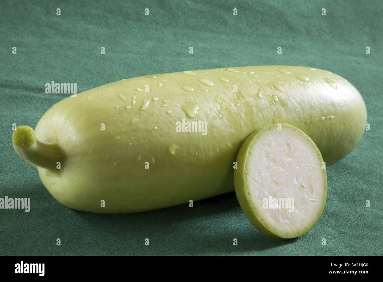 Full Green vegetable Bottle Gourd doodhi lauki with cut slice on green ...