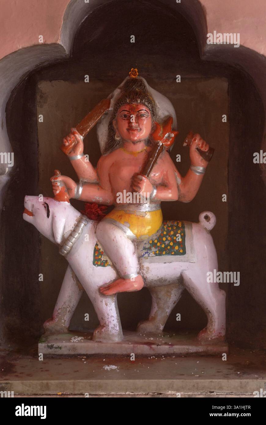Lord Shiva riding on bull Nandi, colorful idol in Kapardikeshwar temple ...