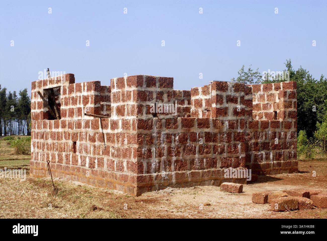 House under construction by using local red Jambha stone known as chira ...