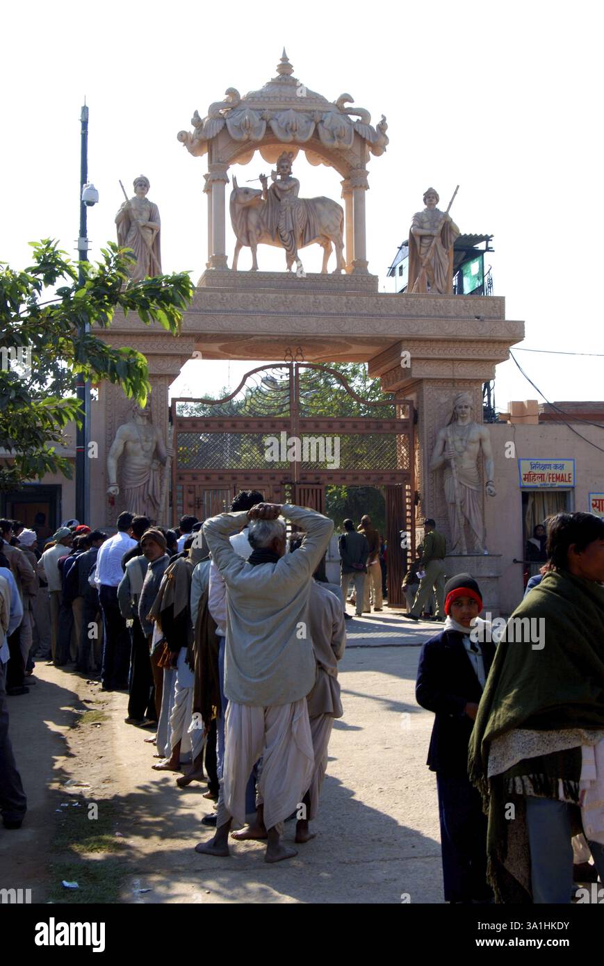 Queue of people at back gate of Krishna Janmabhumi temple, Mathura ...