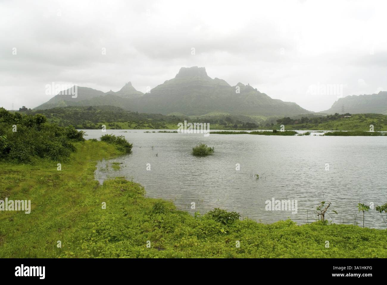 Panvel dam and mountain chanderi in monsoon, Taluka Panvel, district ...