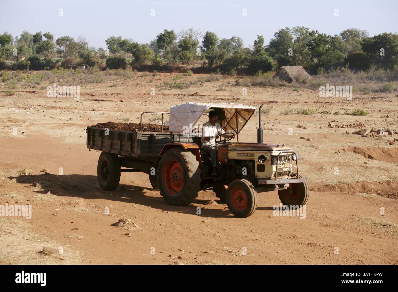 An Indian tractor with trolley, Bassapur village, Karnataka, India ...