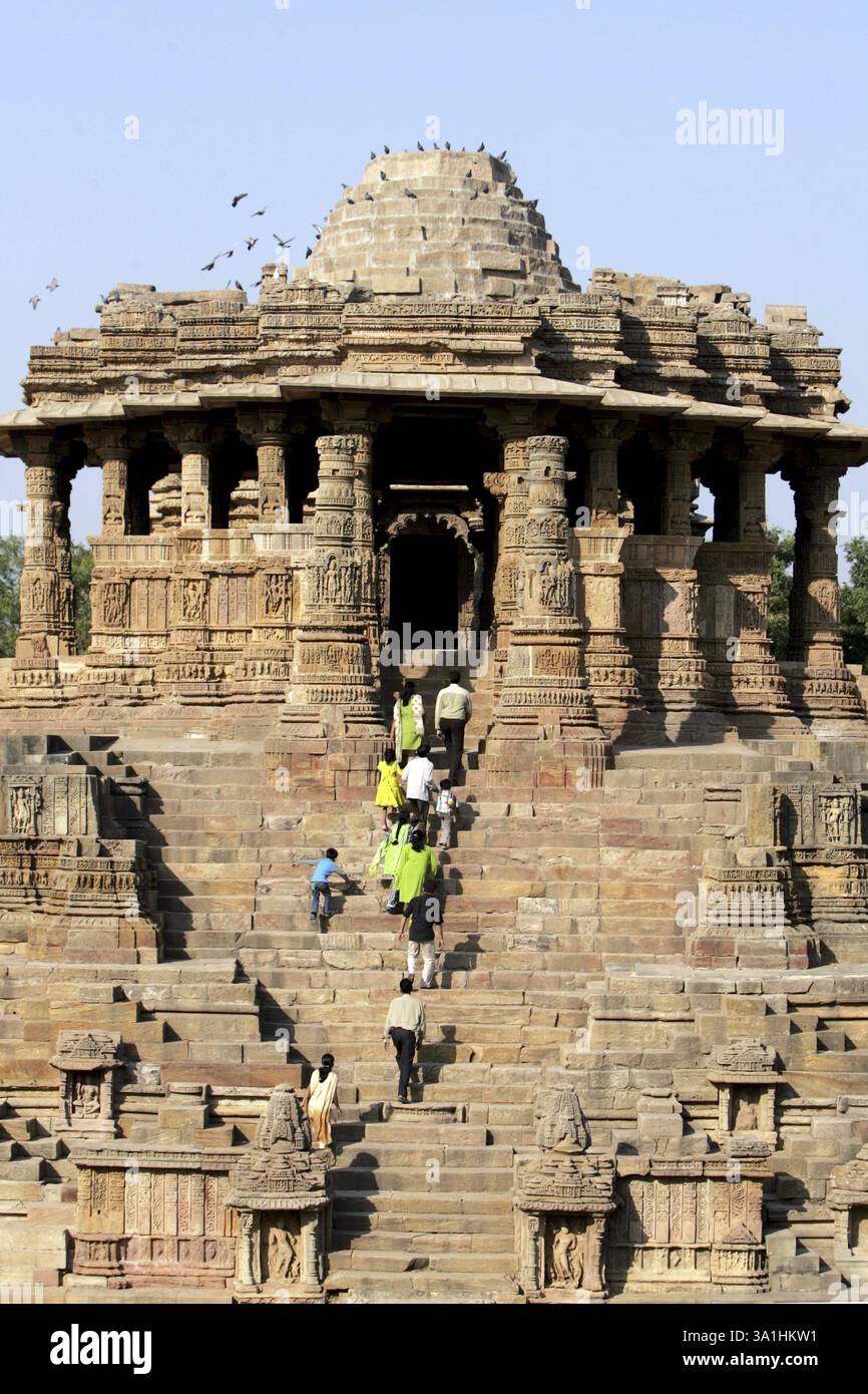 Tourists enjoying walking at Surya Kund in the complex of the Modhera ...