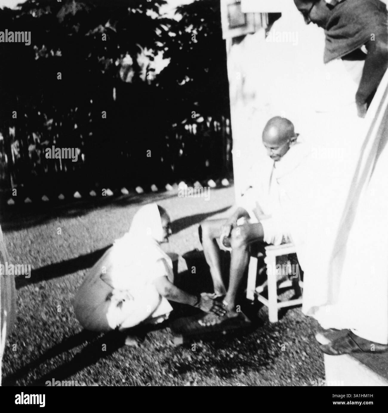 Kasturba Gandhi washing Mahatma Gandhi's feet at Bardoli, 1939, India ...