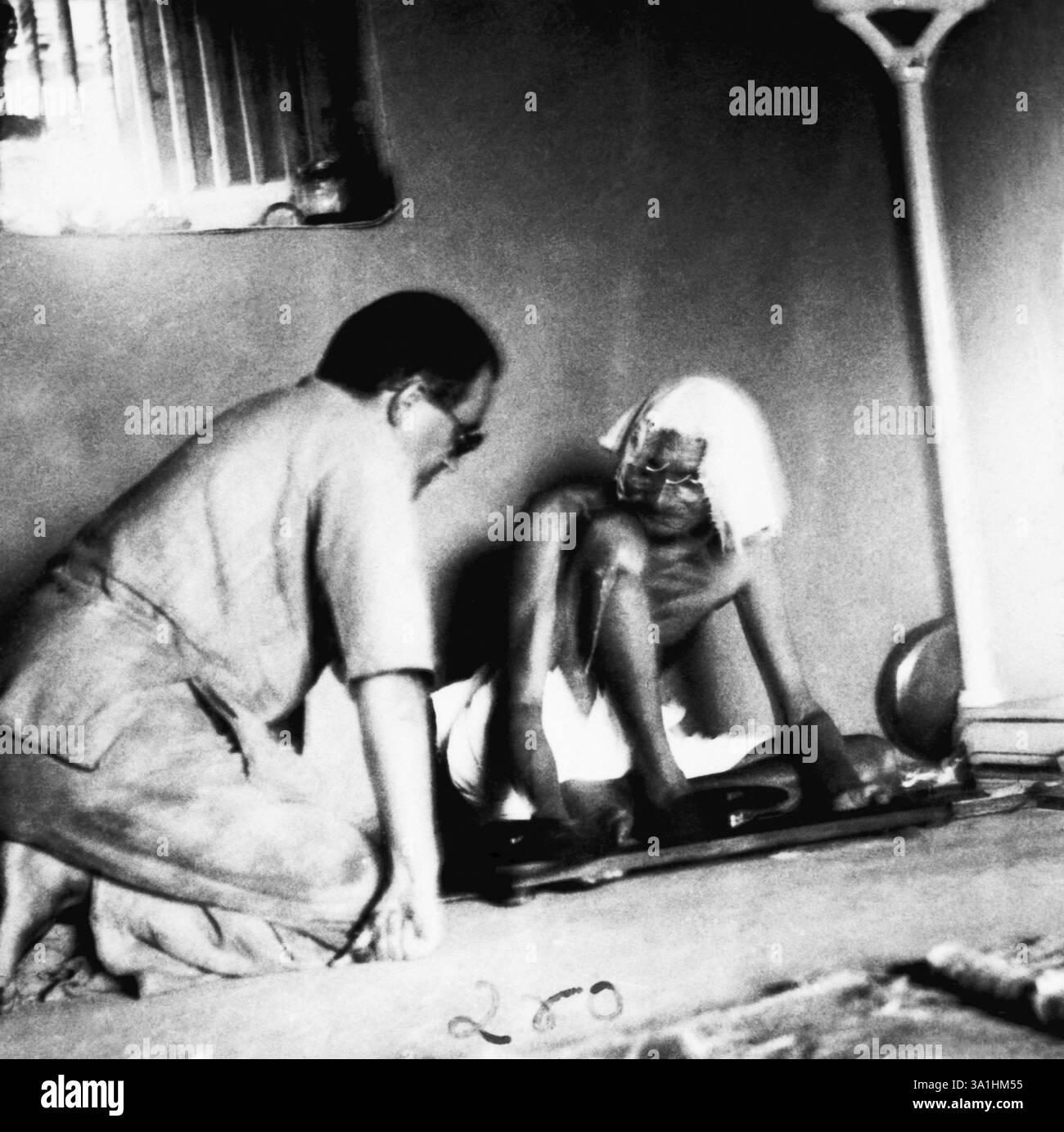 Bharat Anand observing Mahatma Gandhi spinning in his hut at Sevagram ...