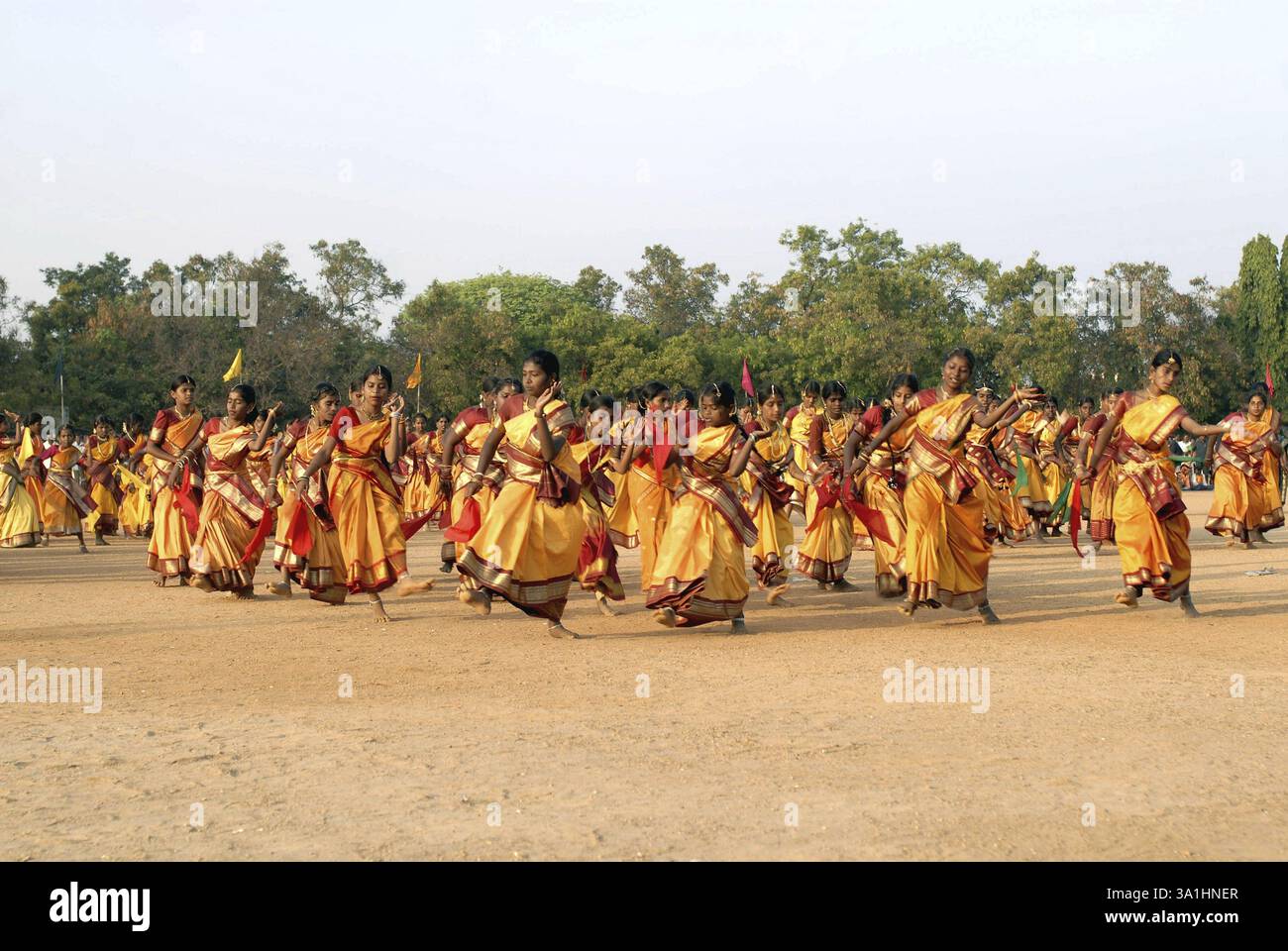 Women performing traditional Indian dance on ground for special ...