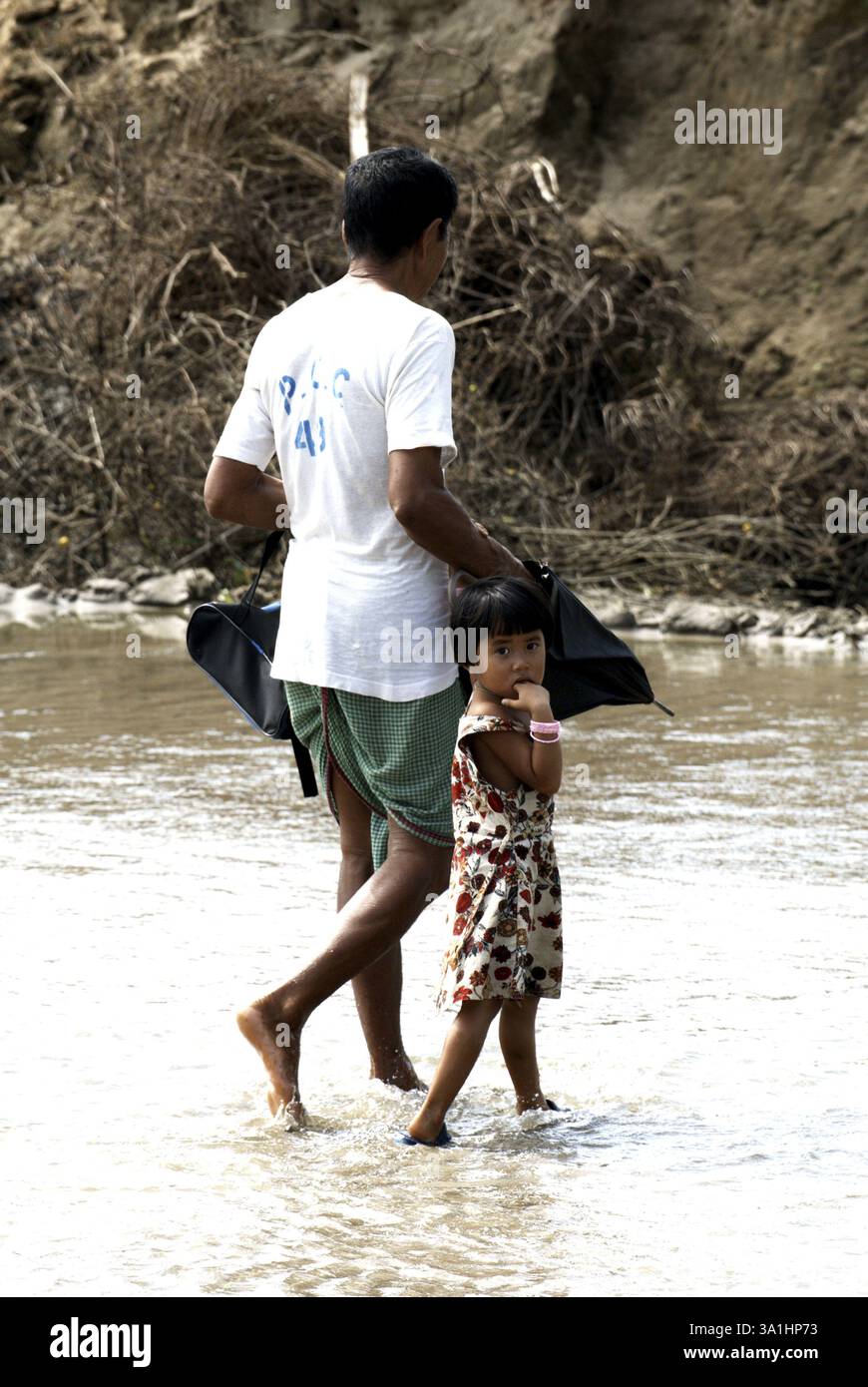 Man walking with his child, Chakma tribal, Arunachal Pradesh, India ...