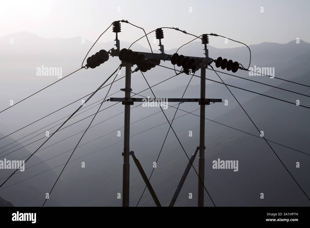 Electric pole with high voltage power supply wires, Himalaya, Nagthat ...