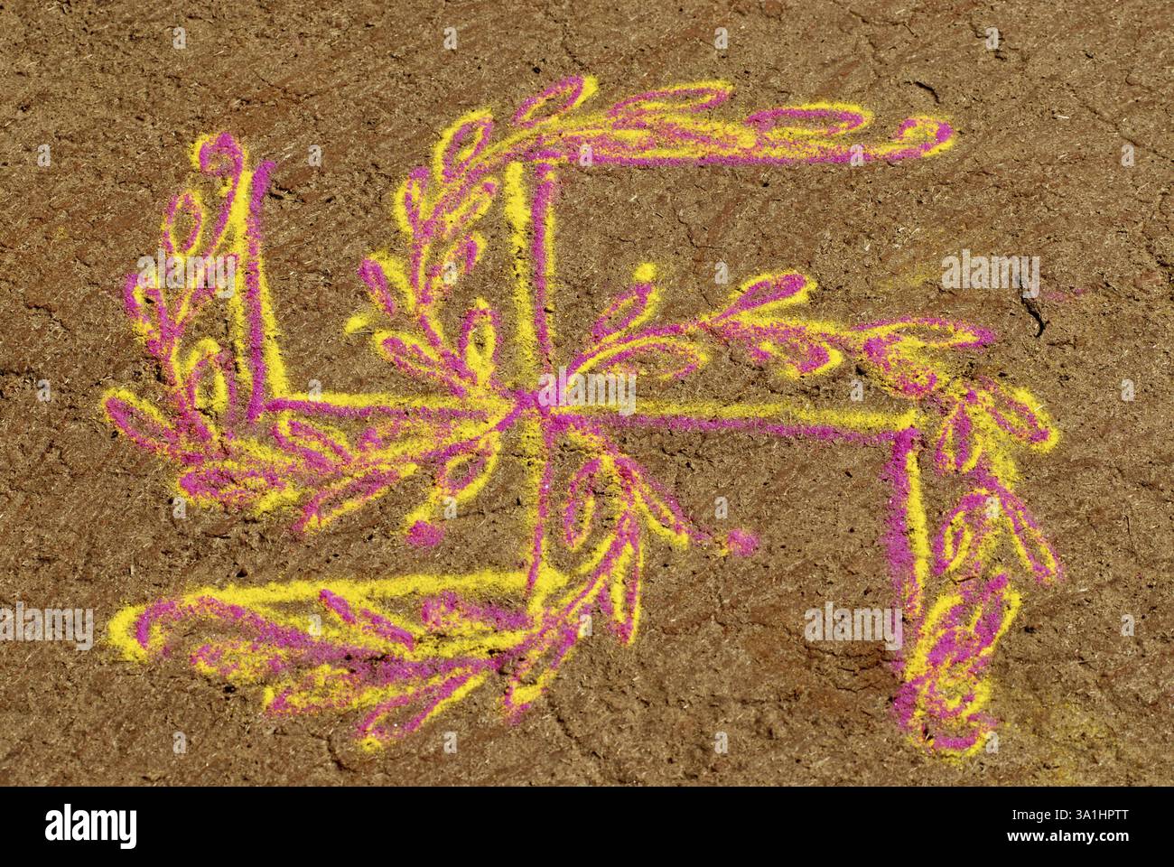 Swastika, Symbol of the Sun God, Floor design drawn with colored powder ...