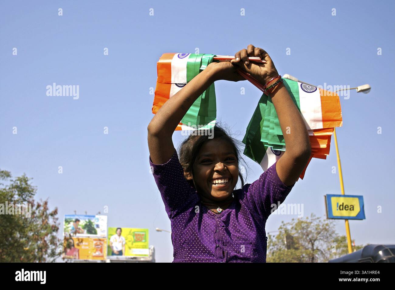 Girl smiling with National flag on Independence day Stock Photo - Alamy