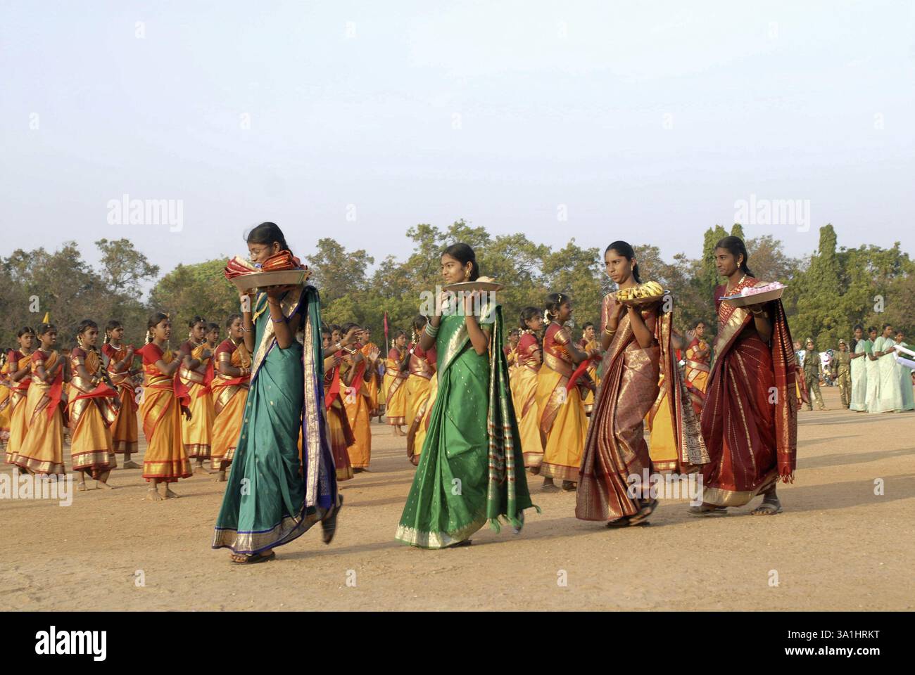 Women performing traditional Indian dance on ground for special ...