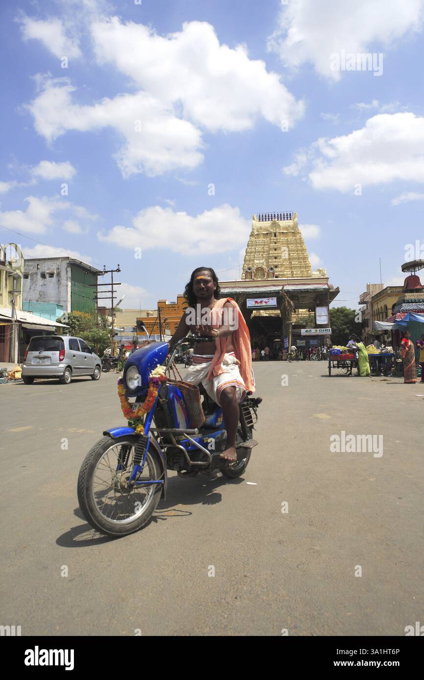 Hindu priest brahmin driving motor cycle, district Kanchipuram, state ...