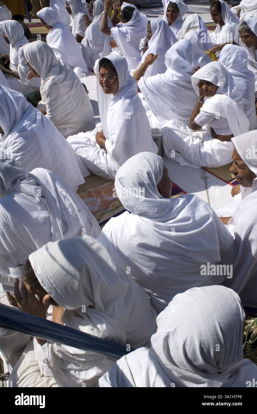 Jain sadhvi sitting in mahamastakabhisheka head anointing ceremony, Sravanabelagola, Karnataka ...