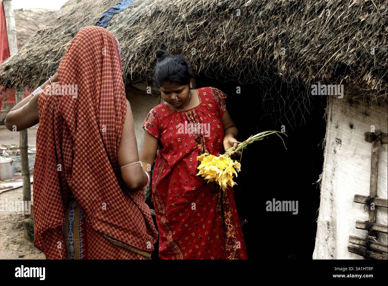 Women standing outside of hut, Bhubaneswar, Orissa, India, Asia Stock ...