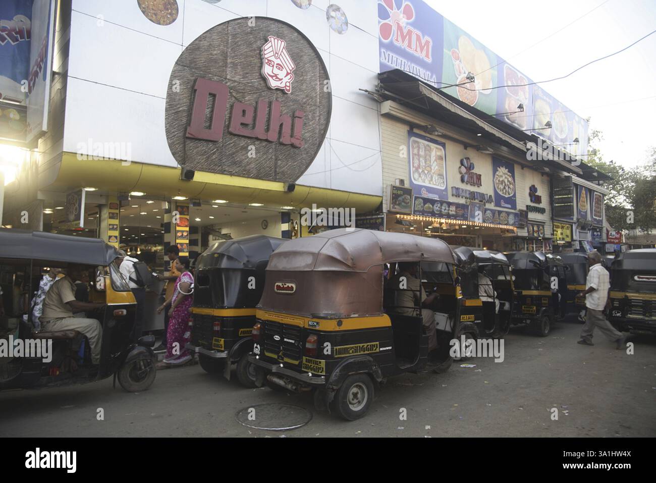 Auto rickshaw standing at Delhi restaurant, Mulund, Bombay Mumbai ...