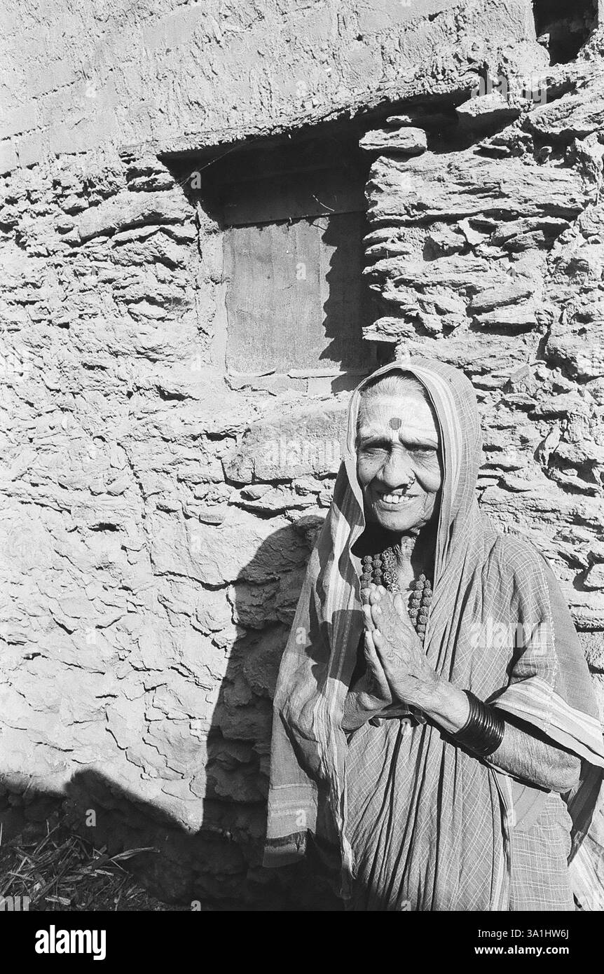 Rural woman standing outside of her house, Lokur village, Dharwar ...