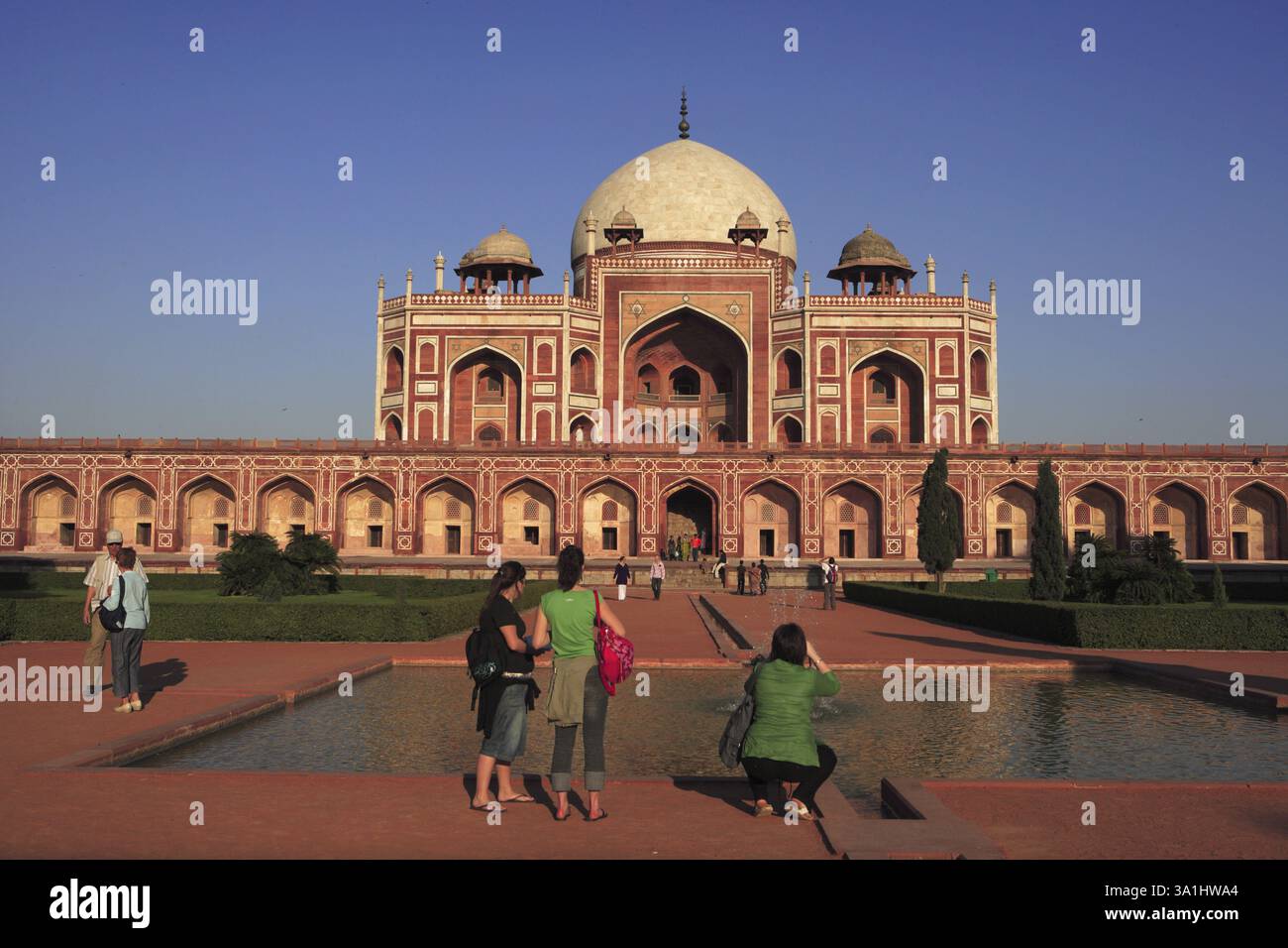 Tourists at Humayun's tomb built in 1570 made from red sandstone and ...