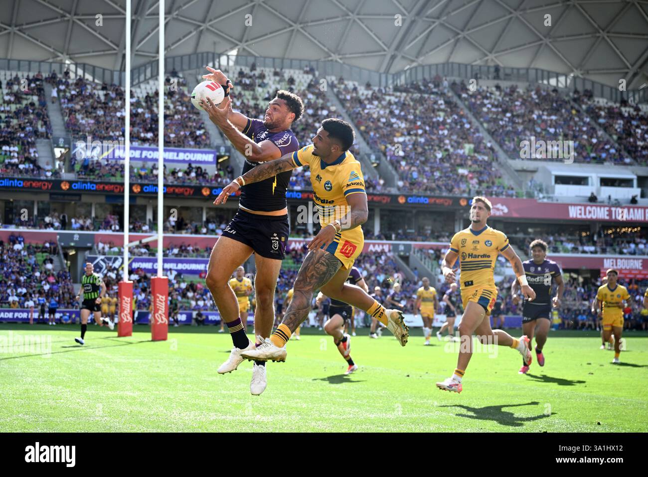 Melbourne, Australia. 09th Mar, 2025. Xavier Coates of the Storm scores ...