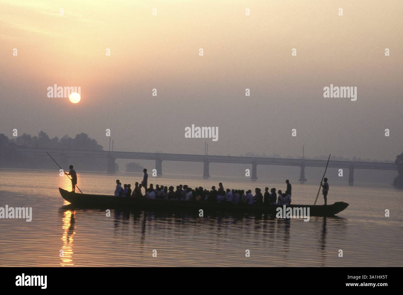 People crossing river pleasant sunrise view at Alua, Kerala, India ...