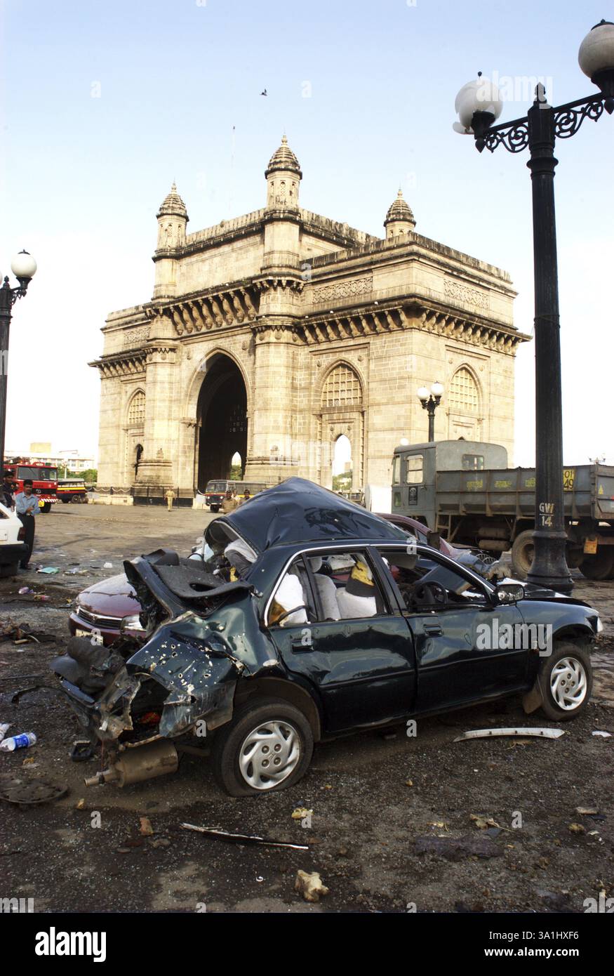 Remains of car parked at the parking lot of Gateway of India damaged by ...