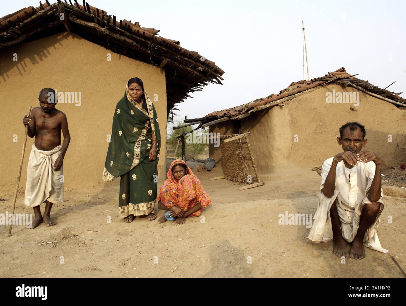 People standing outside hut, Garwa and Latehar, Jharkhand, India, Asia ...