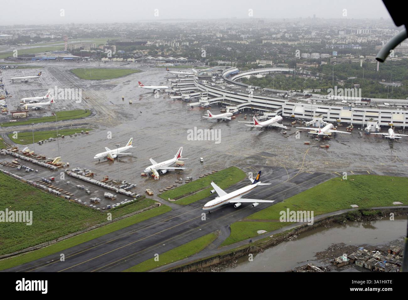 An aerial view of Air India aircrafts parked and runways at airport of ...