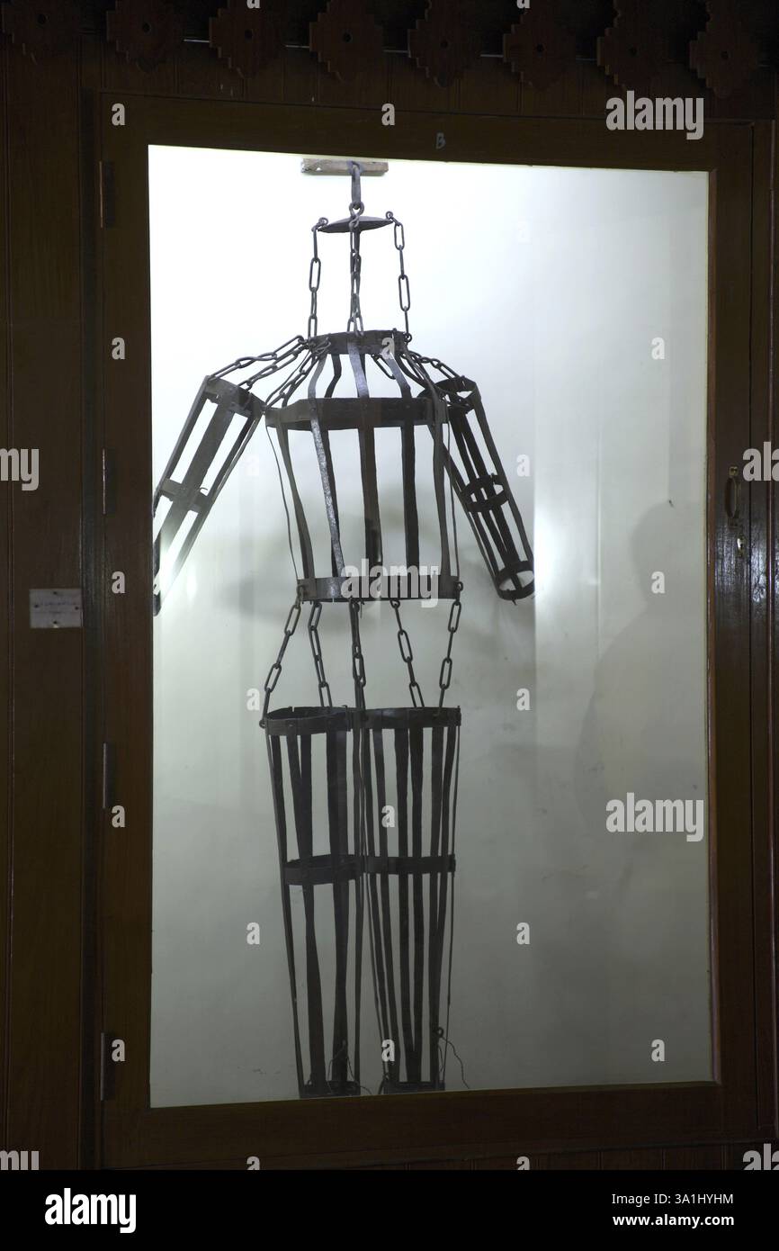 Display of metal ware or metal straitjacket used for punishment ...