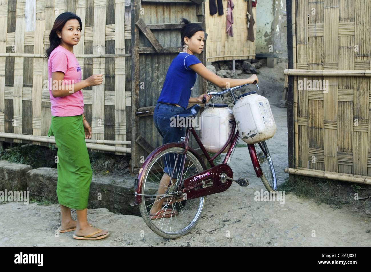 Woman riding cycle, Imphal, Manipur, India, Asia Stock Photo - Alamy