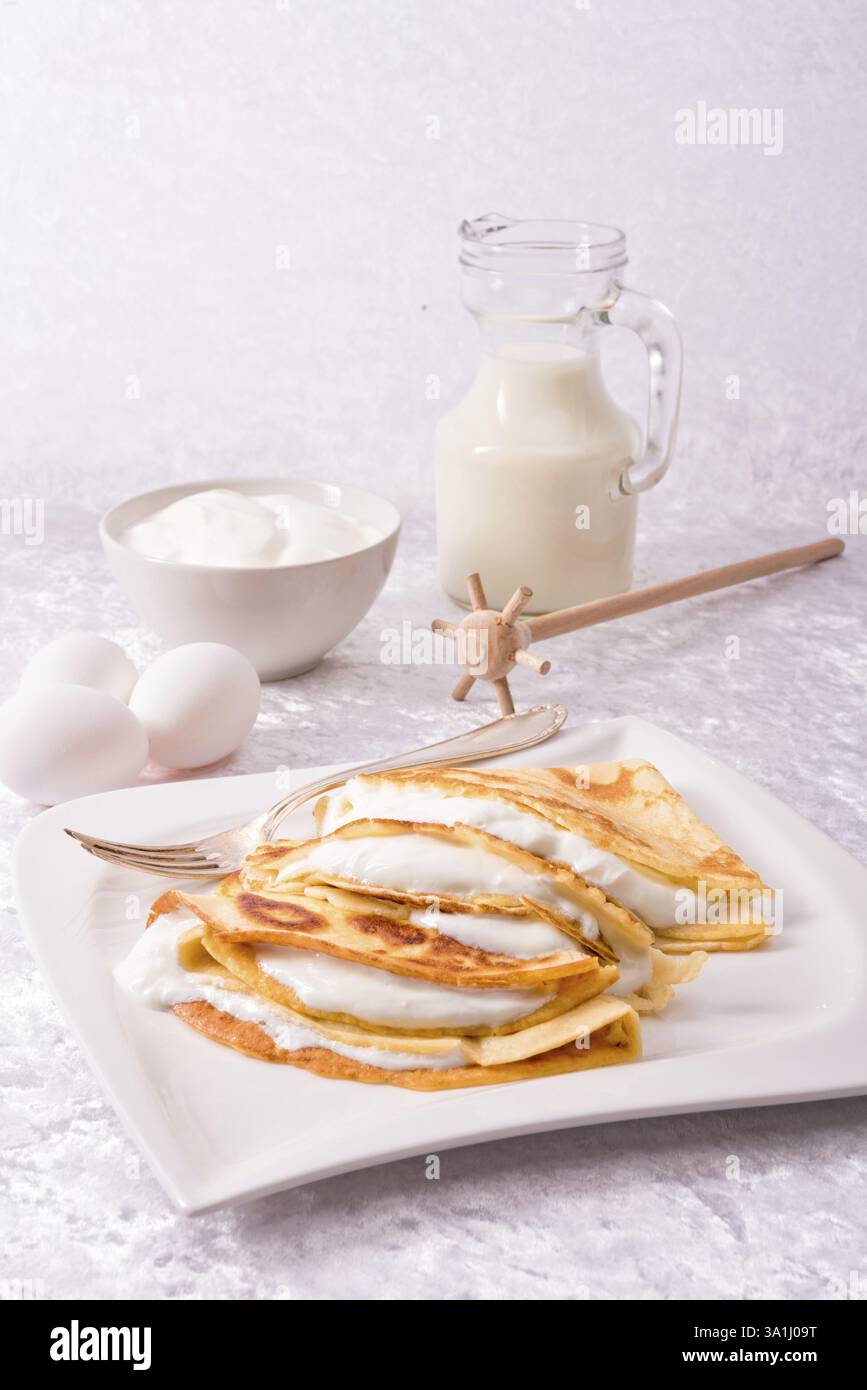 Egg cake with vanilla quark Stock Photo - Alamy