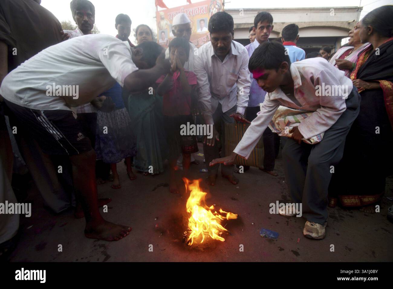 People taking blessings of holy fire lighted of lord Kalbhairav during ...