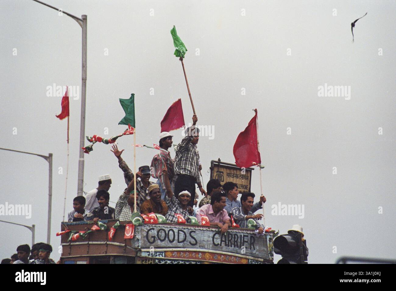 Demonstrator flying flags in air Stock Photo - Alamy