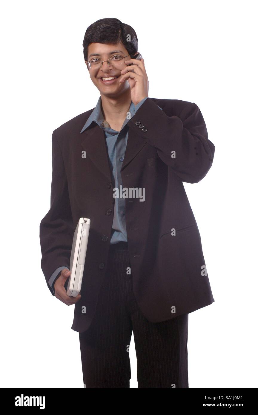 Avish talking on mobile phone, India MR Stock Photo - Alamy