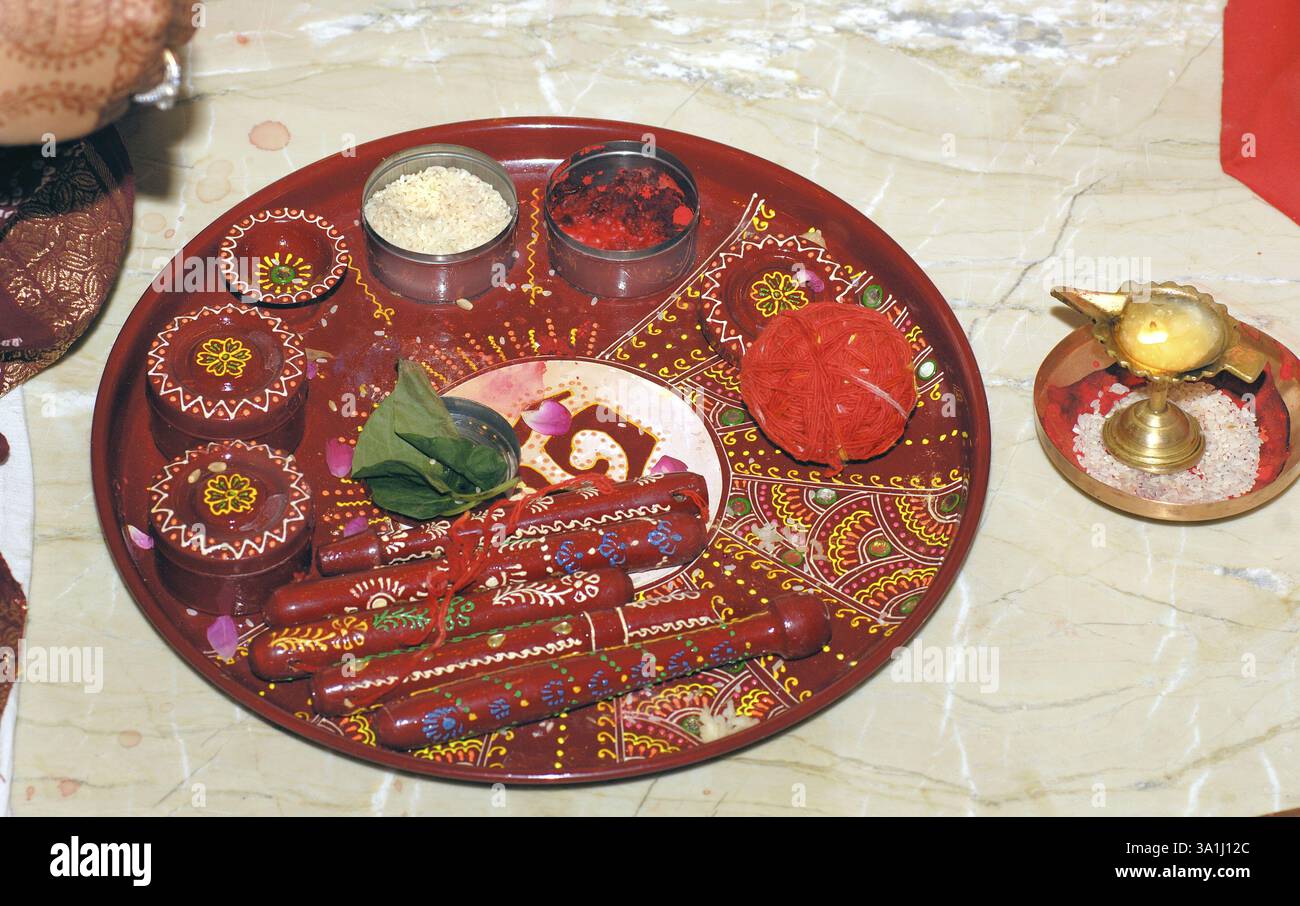 Pooja Samagri in thali Stock Photo - Alamy