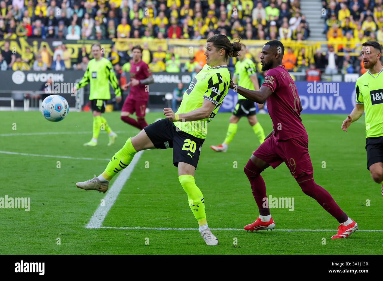 Dortmund, Germany. 8th Mar, 2025. Marcel Sabitzer (L) of Borussia ...