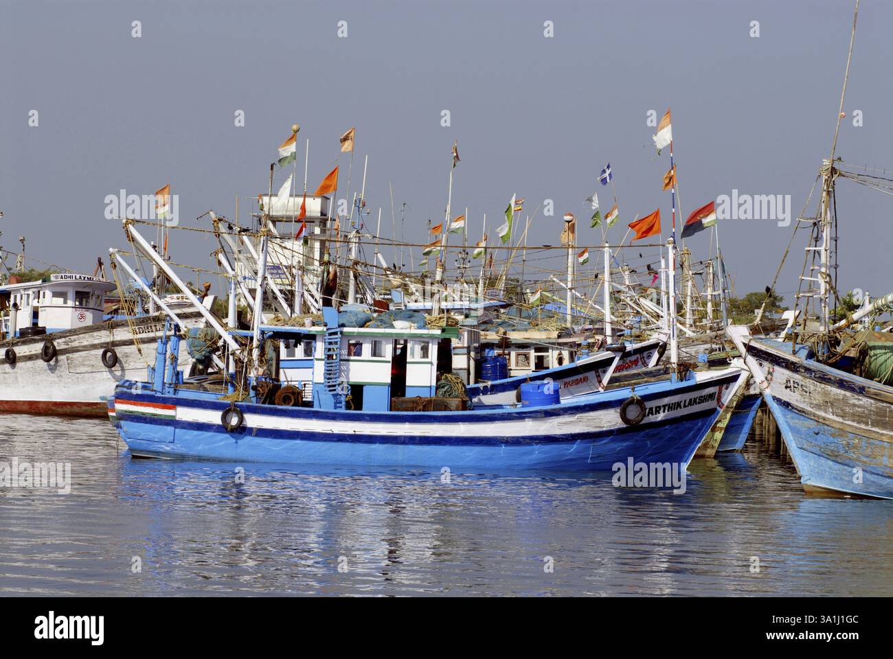 Country fishing boats at huge fishing yard, Udupi, Karnataka, India ...