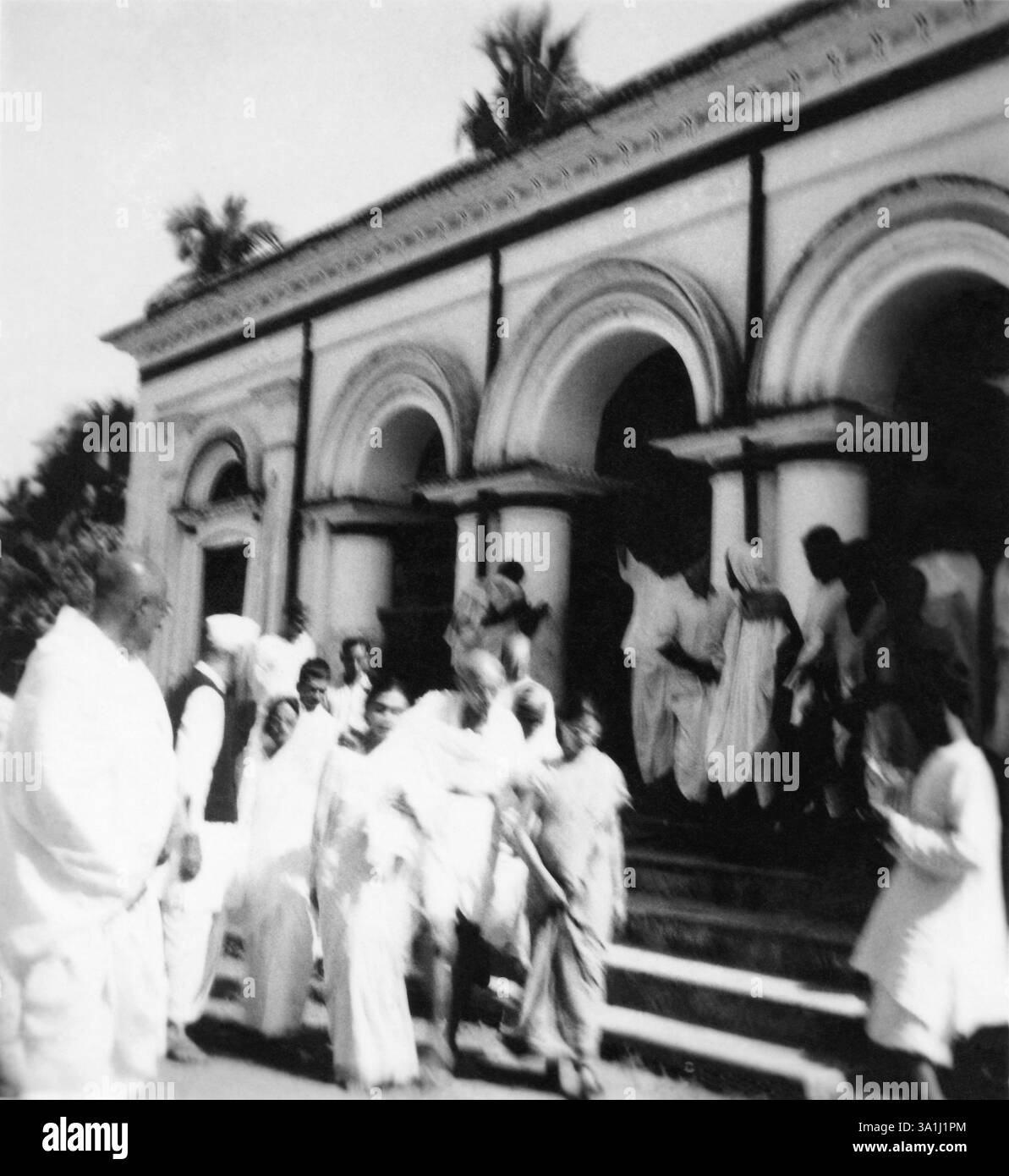 Mahatma Gandhi and others walking in the village Kajir Khil at NAakhali ...