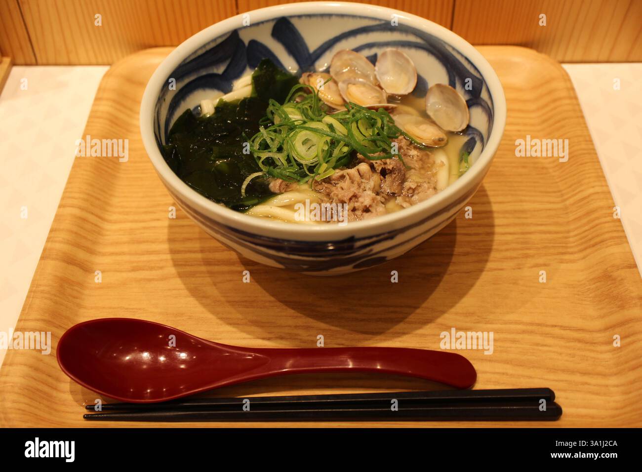 Japanese cuisine: wakame (seaweed) and asari (Manila clam) udon noodles ...