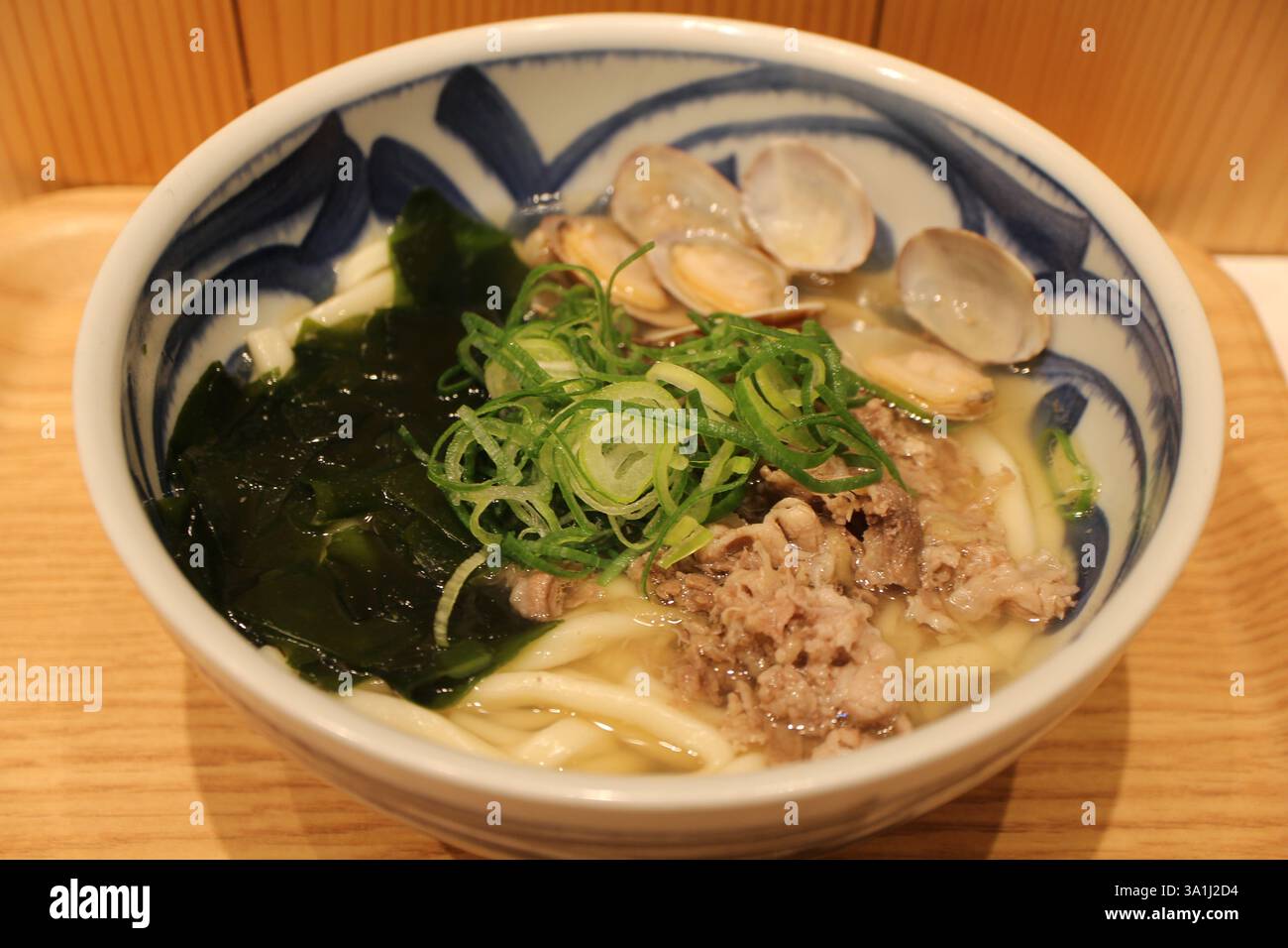 Japanese cuisine: wakame (seaweed) and asari (Manila clam) udon noodles ...