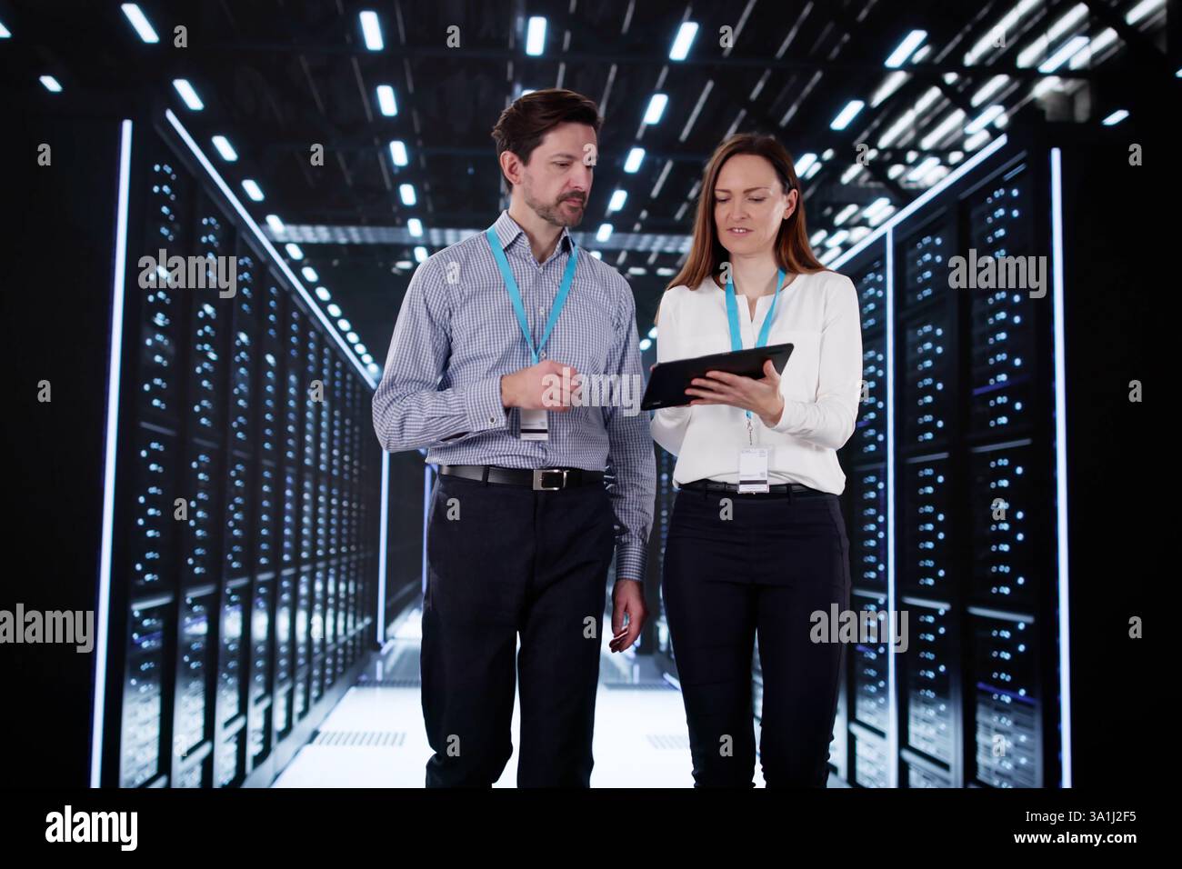 In server room woman using hi-res stock photography and images - Alamy