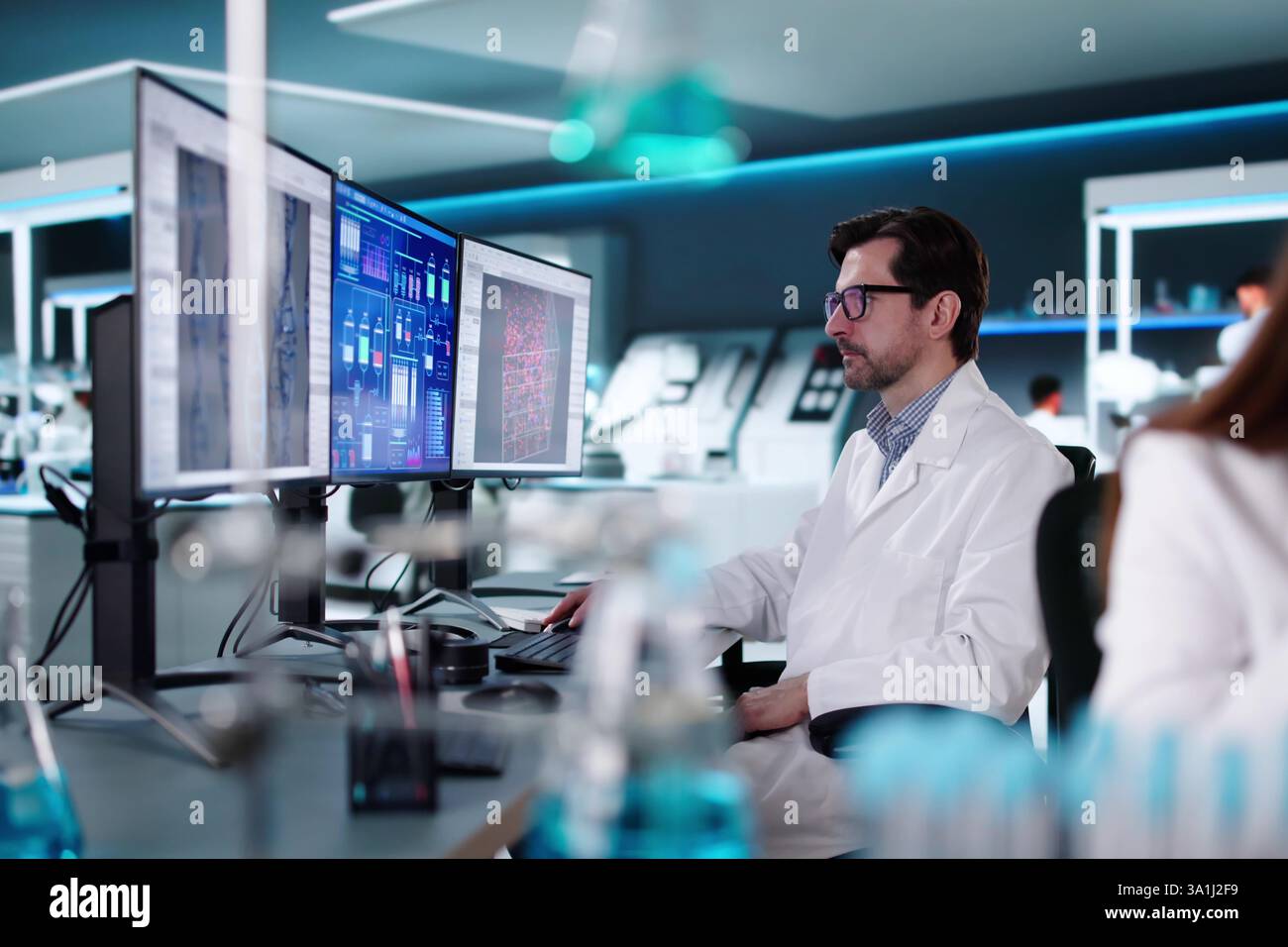 Science engineer using microscope analyze hi-res stock photography and ...