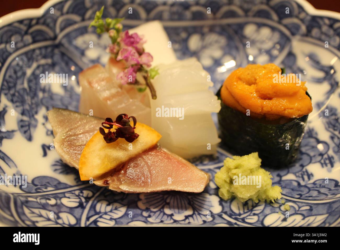 Japanese cuisine: assorted sashimi (olive flounder, mackerel, squid ...
