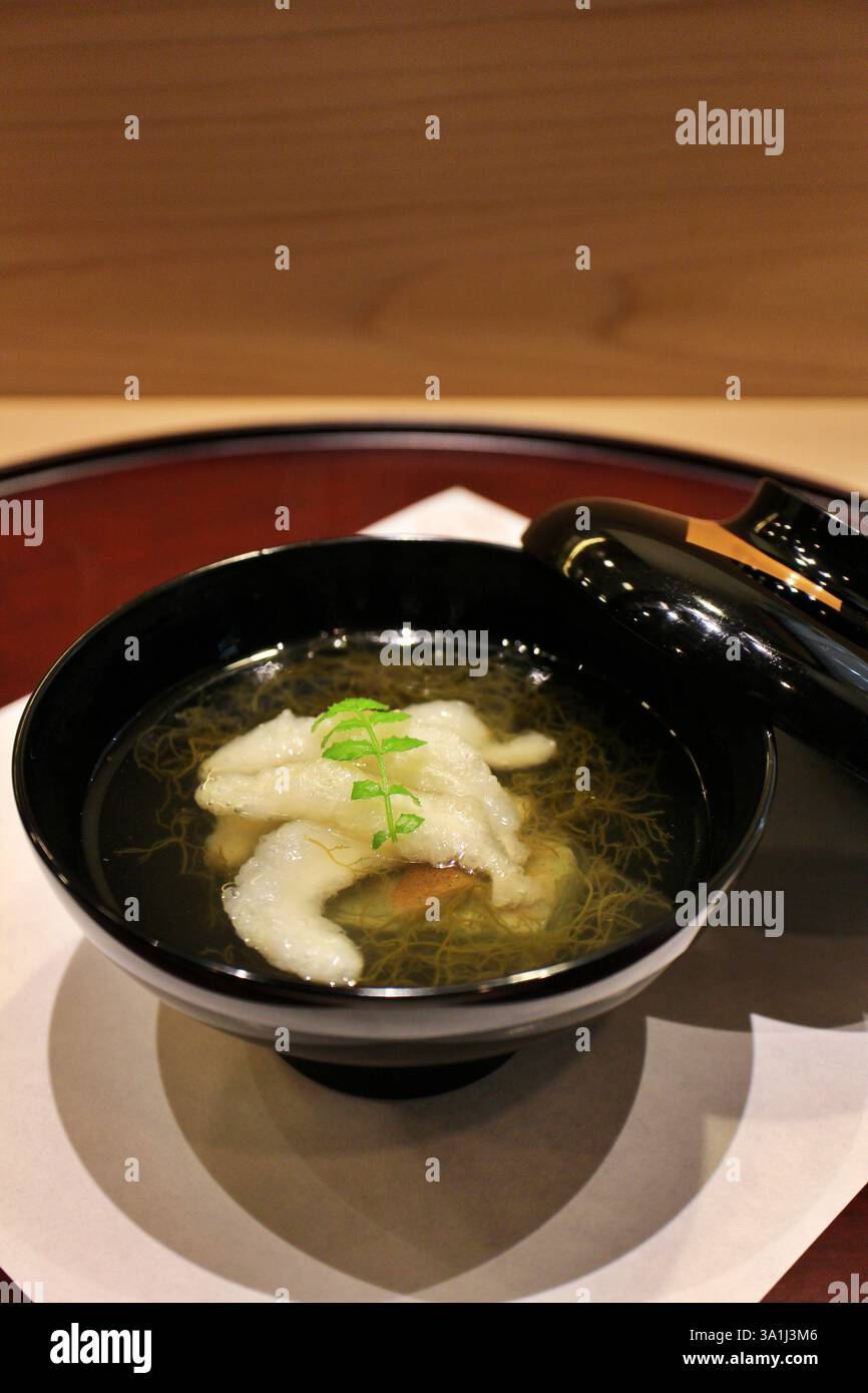 Japanese cuisine: icefish soup with mozuku seaweed and namafu (wheat ...