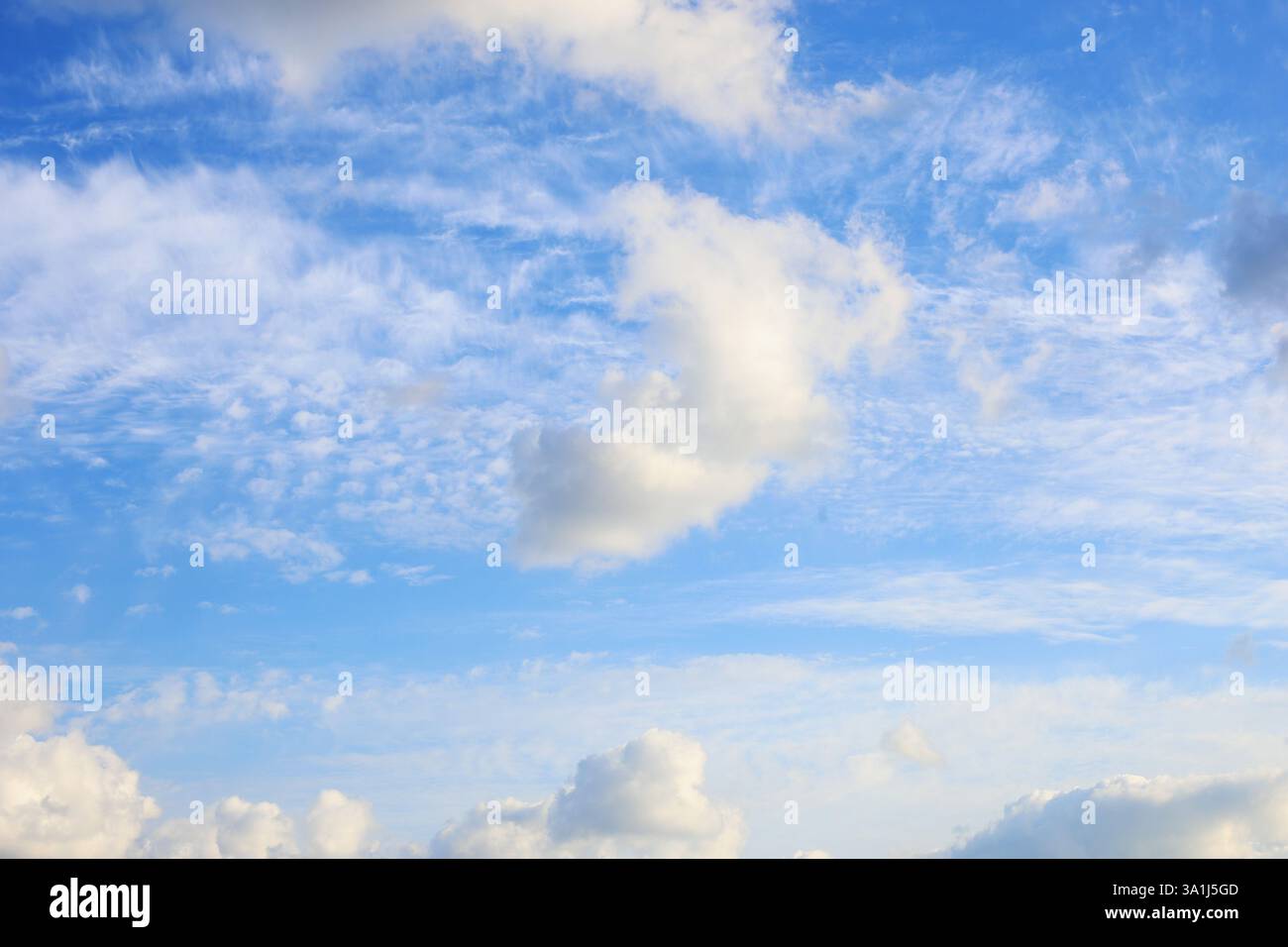 Beautiful Blue Sky with Fluffy White Clouds Stock Photo - Alamy