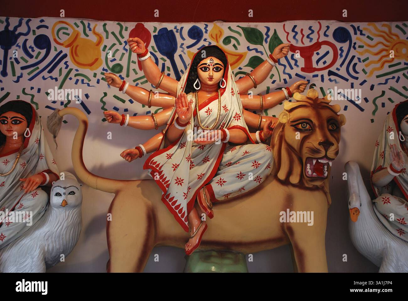 Durga clay model sitting on lion on Durga puja Stock Photo - Alamy