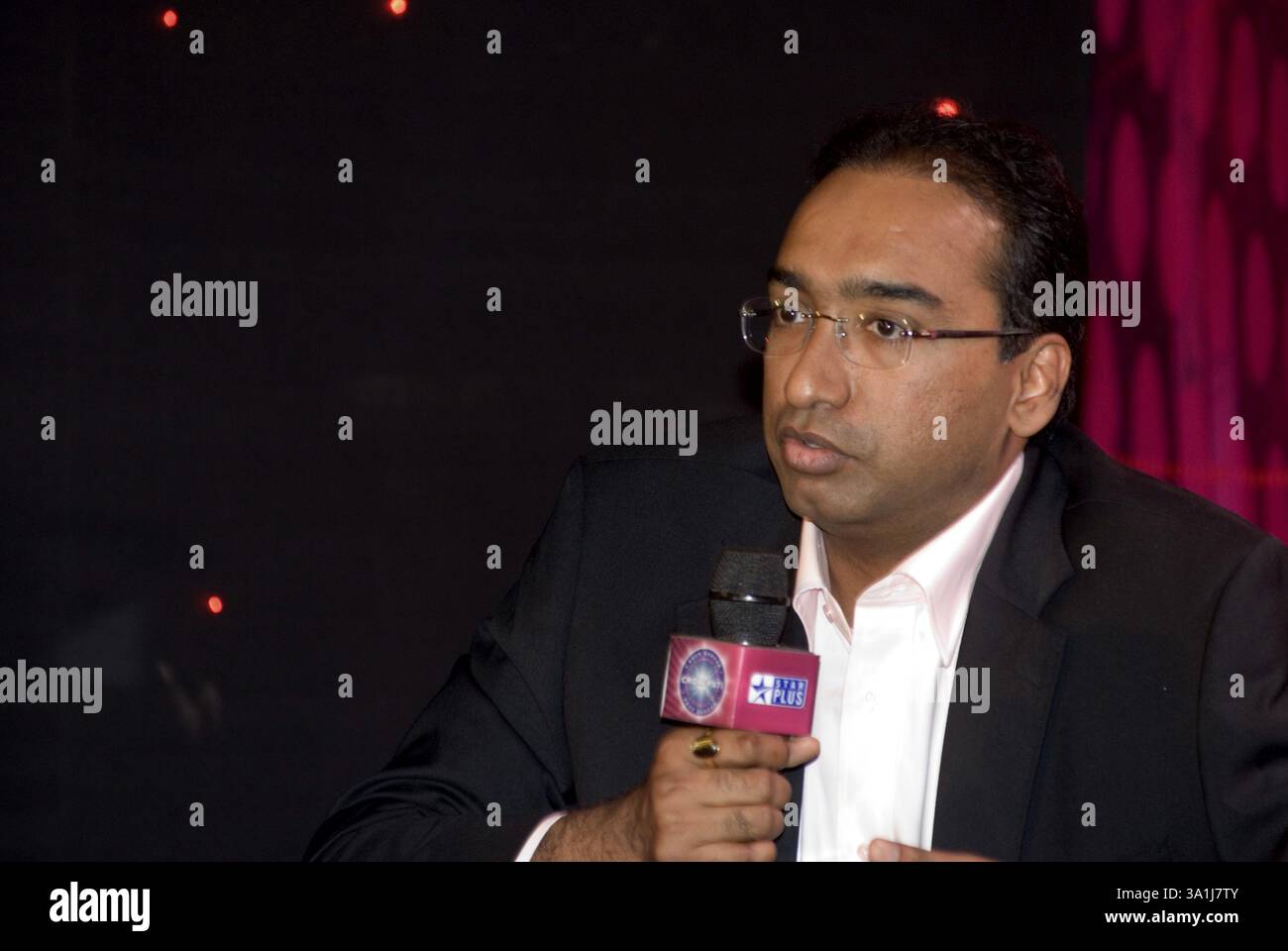 South Asian Indian celebrity Sameer Nair addressing a Kaun Banega ...